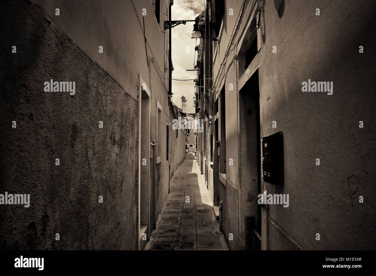 Alley view with historical buildings in Venice, Italy Stock Photo - Alamy