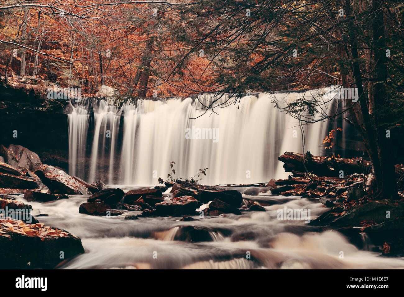 Autumn waterfalls in park with colorful foliage Stock Photo - Alamy