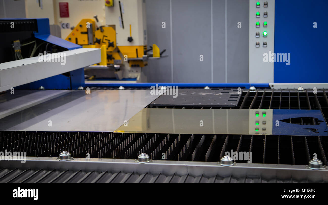 CNC laser cutting machine cut sheet of metal Stock Photo - Alamy