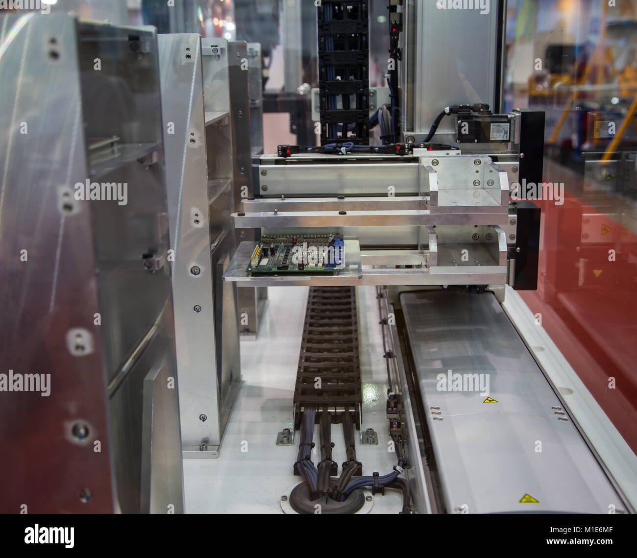 CNC electronic circuit board handling Stock Photo - Alamy