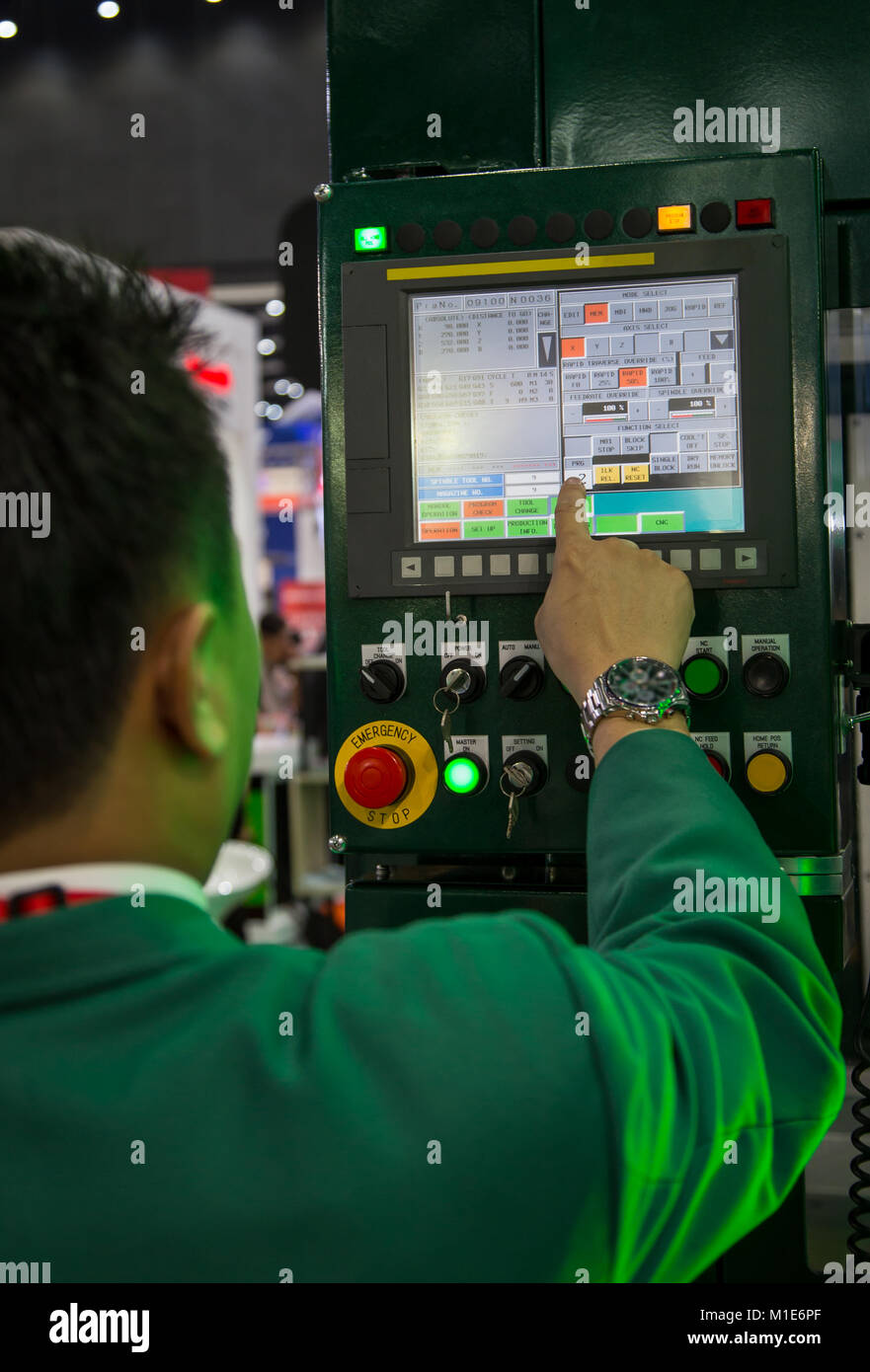 Technician input data programing for CNC machine Stock Photo - Alamy