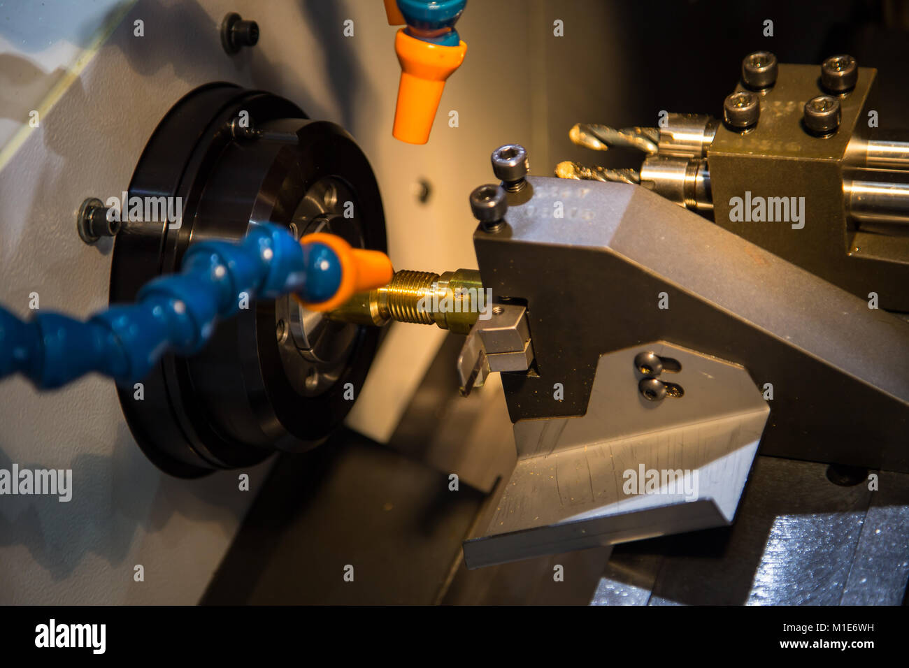 Thread cutting on CNC lathing machine Stock Photo - Alamy