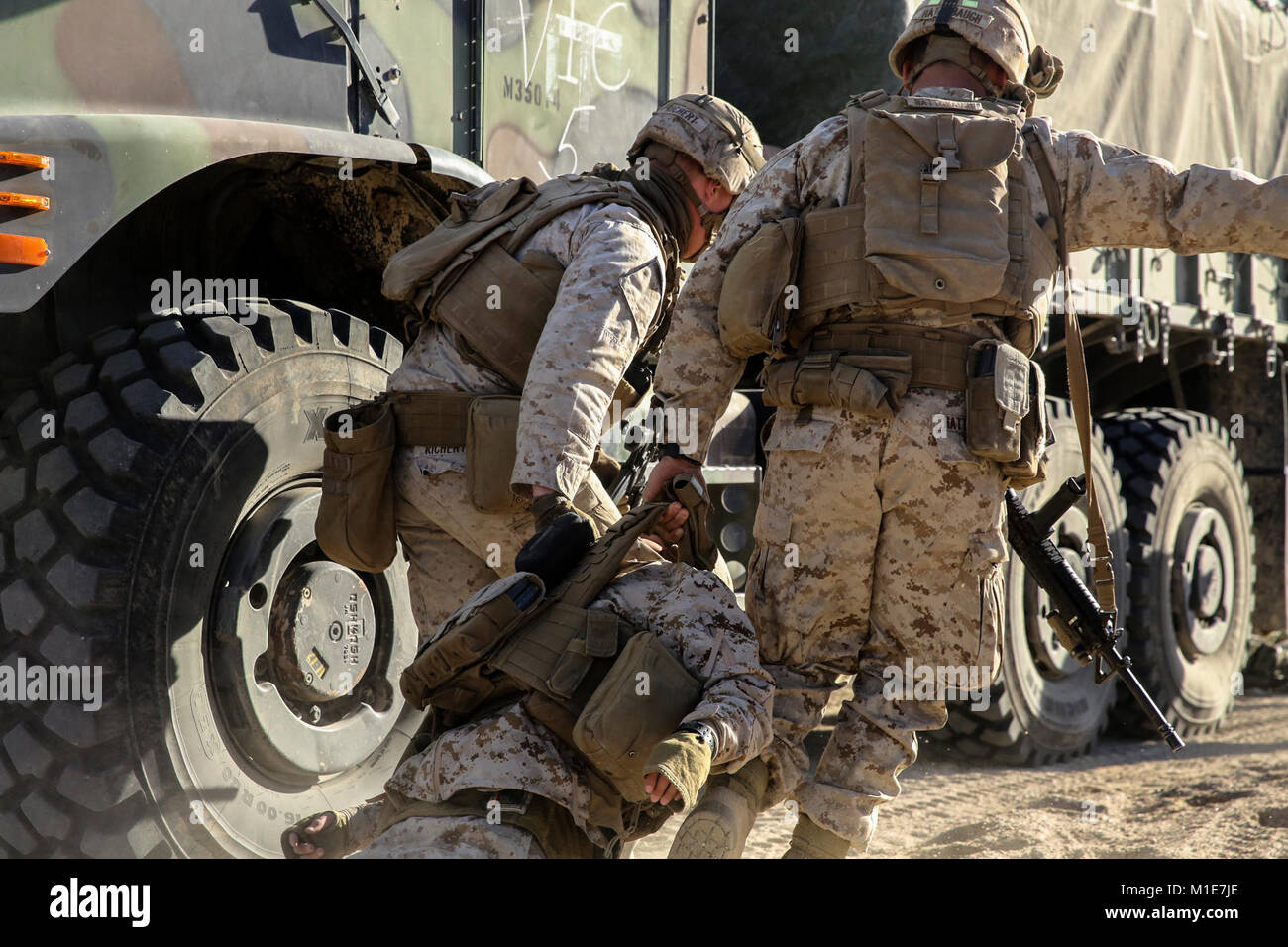 Marines with Combat Logistics Battalion 3 drag a simulated casualty ...