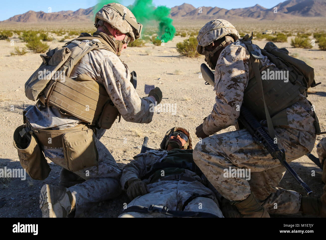 Marines with 2nd Battalion, 3rd Marine Regiment assess a simulated ...