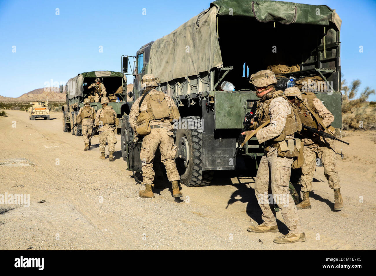 Marines with Combat Logistics Battalion 3 exit their vehicle and ...