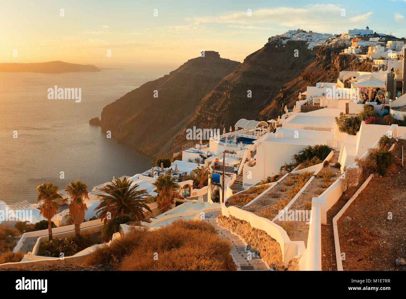 Santorini skyline sunset with buildings in Greece Stock Photo - Alamy