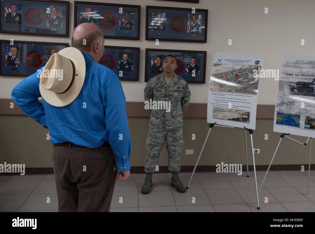 Airman 1st Class Joseph Alviedo, 734th Air Mobility Squadron, right ...
