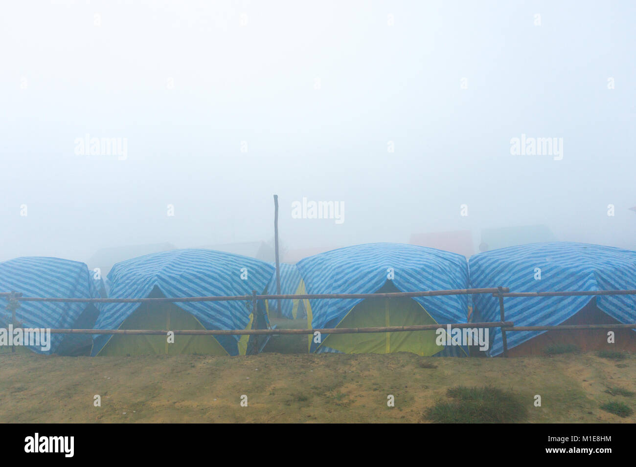 tourist tent in mist and fog. Travel tent in the morning with fog Stock ...