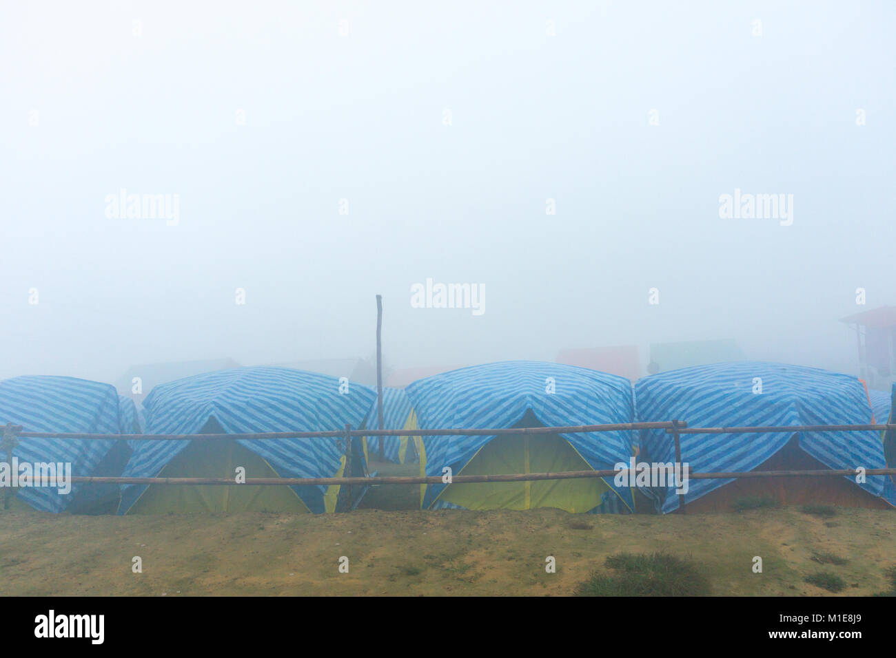tourist tent in mist and fog. Travel tent in the morning with fog Stock ...