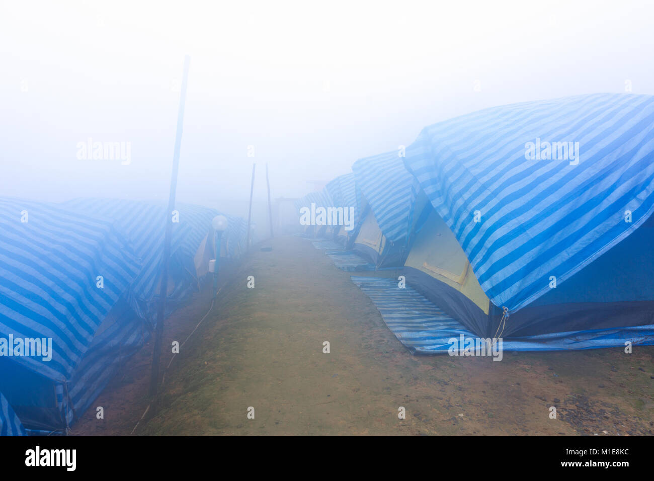 tourist tent in mist and fog. Travel tent in the morning with fog Stock ...