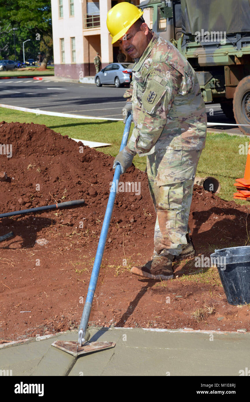 Sgt. Jose Garcia, a carpentry and masonry specialist assigned to the ...