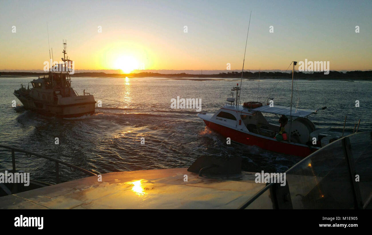 A 47-foot Motor Life Boat crew from Coast Guard Station Hatteras Inlet ...