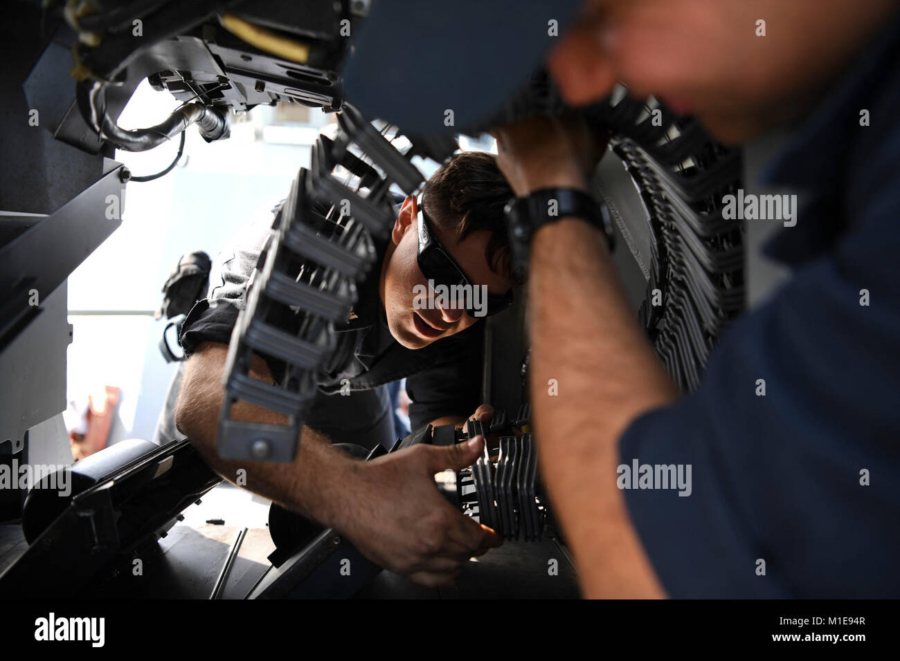 (Jan. 26, 2018) Gunner’s Mate 3rd Class Bryan Amador, left, and Gunner ...