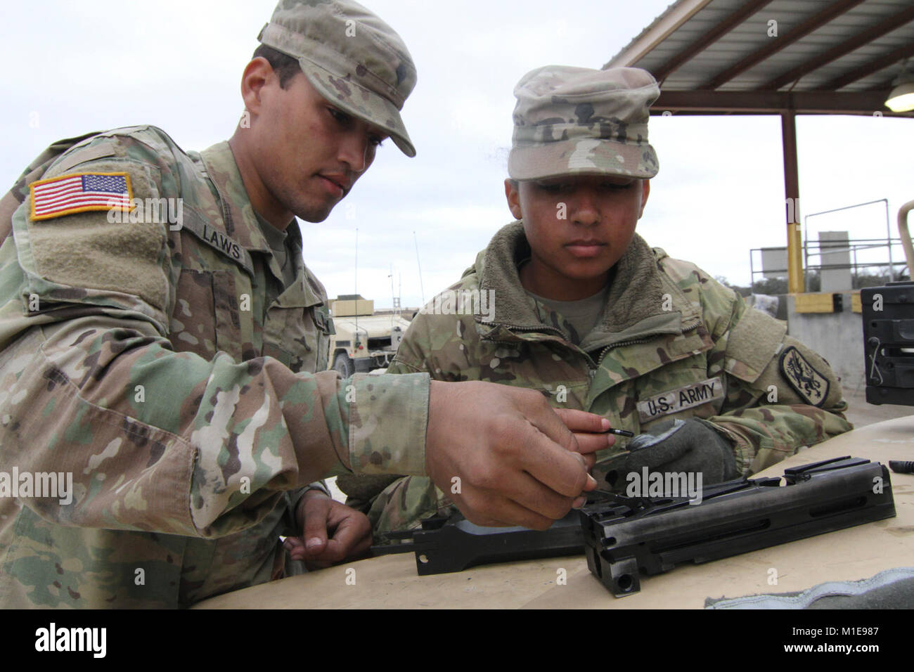 Army Reserve Spc. William Laws (left), a chemical, biological ...