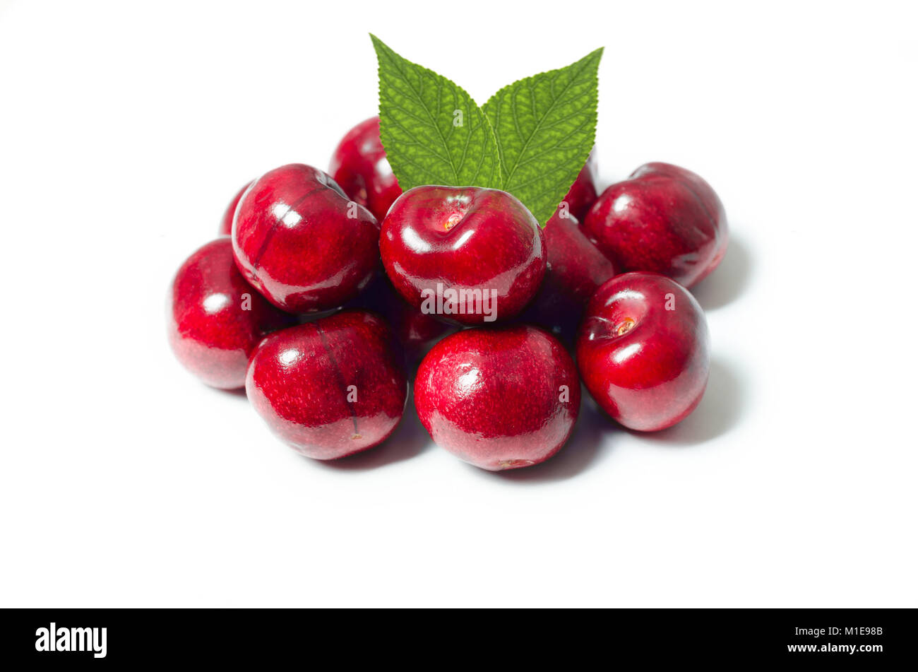 Group of cherries isolated on white background Stock Photo - Alamy