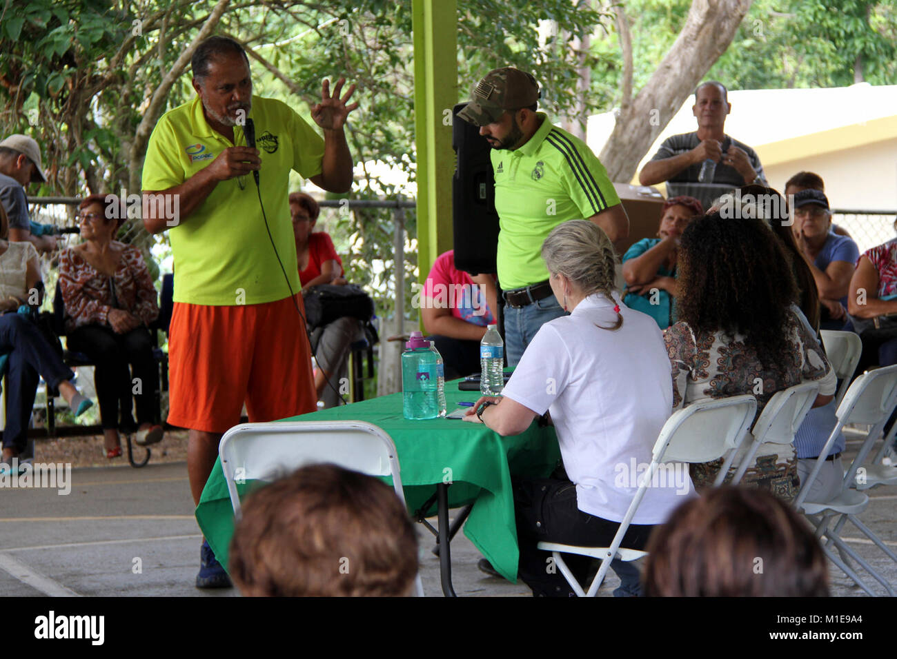 A Villalba, Puerto Rico resident shares feedback at a neighborhood ...