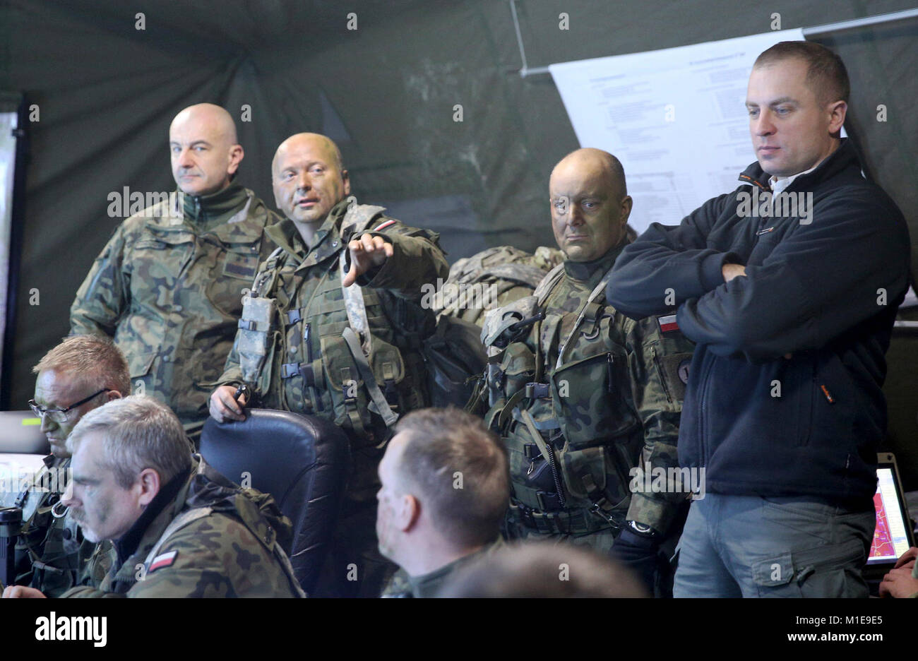 Polish Army Soldiers with the 12th Mechanized Brigade brief the Polish ...