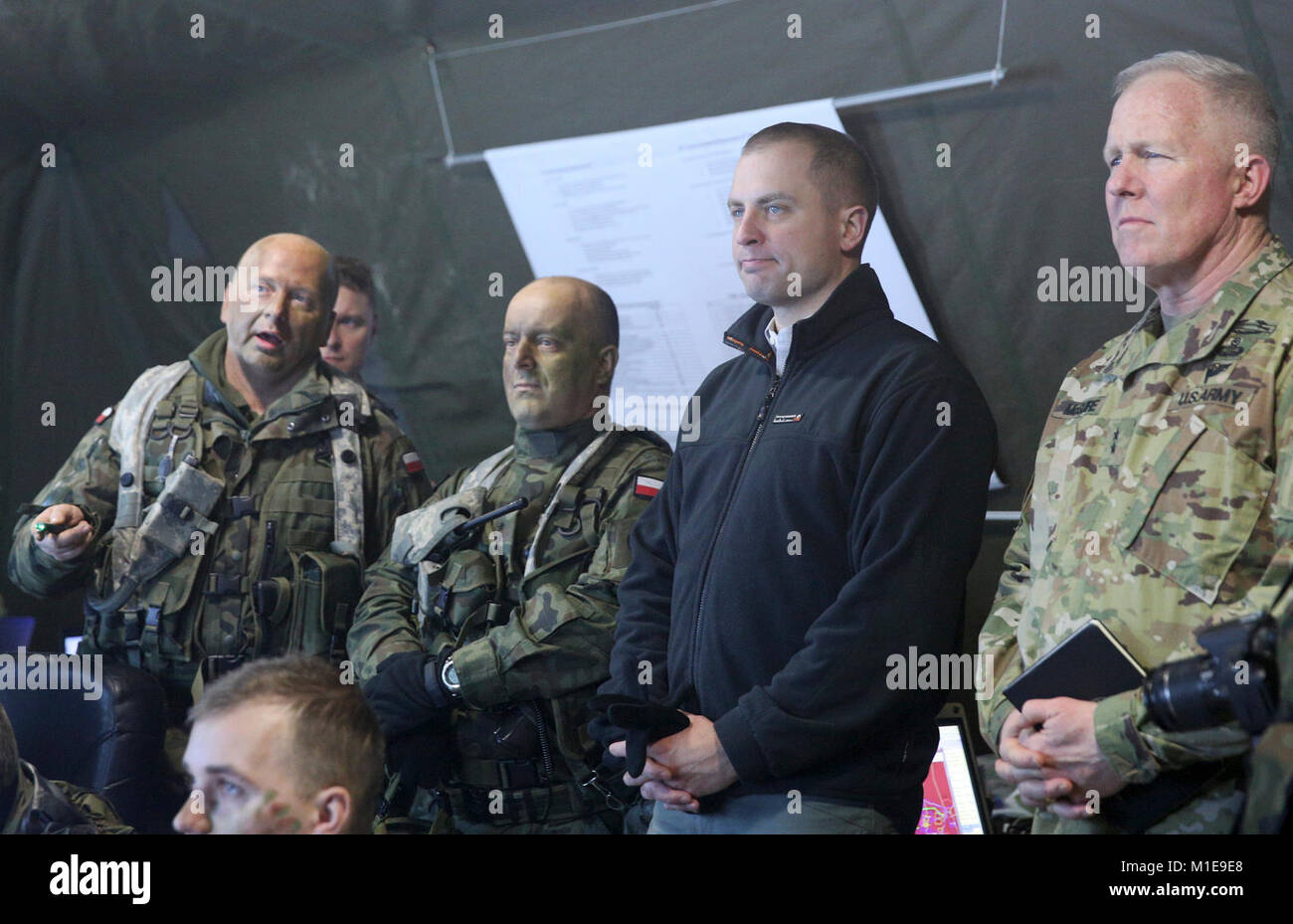 Polish Army Soldiers with the 12th Mechanized Brigade brief the Polish ...