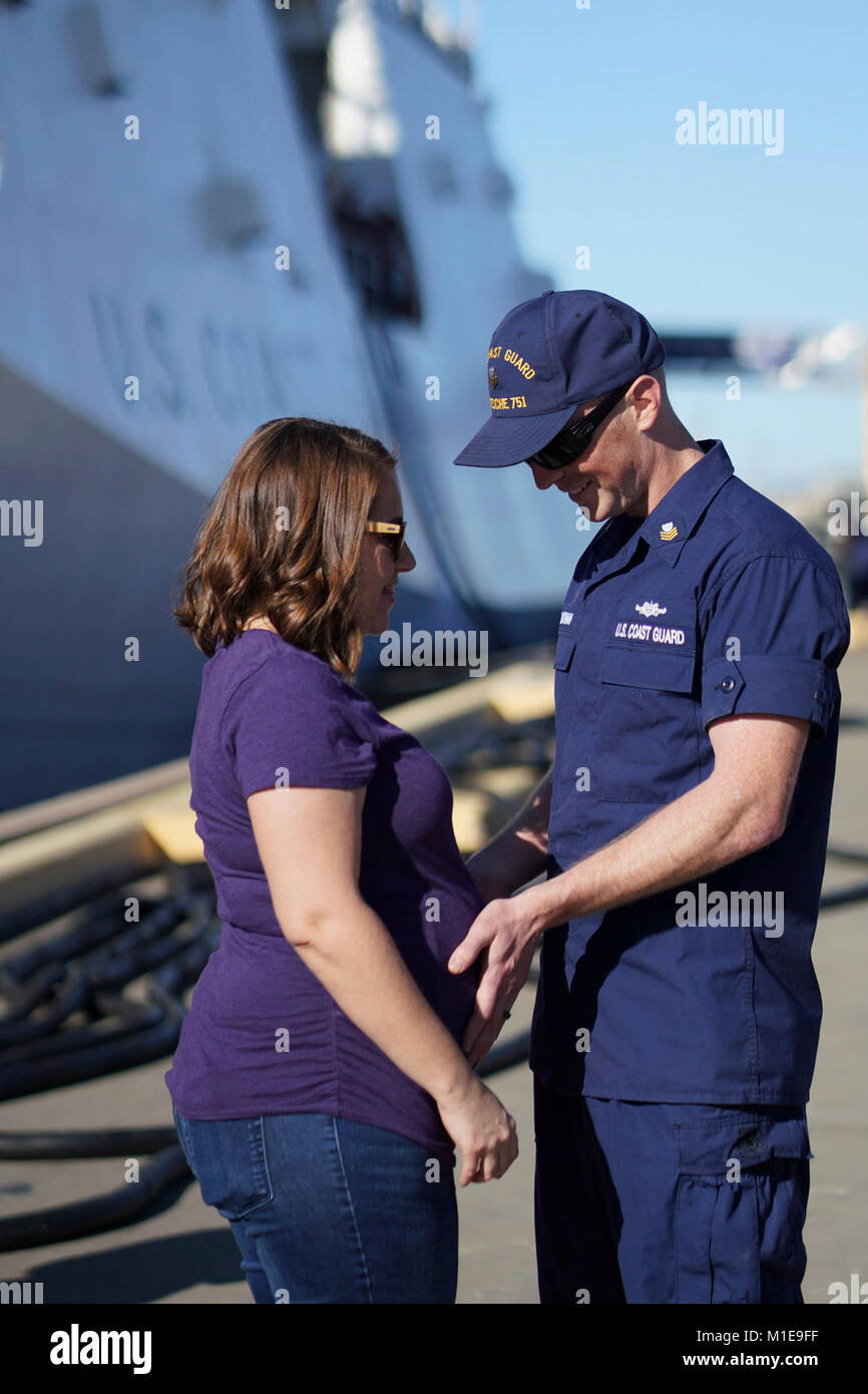 Meredith McGowan greets her husband Petty Officer 1st Class Jason ...