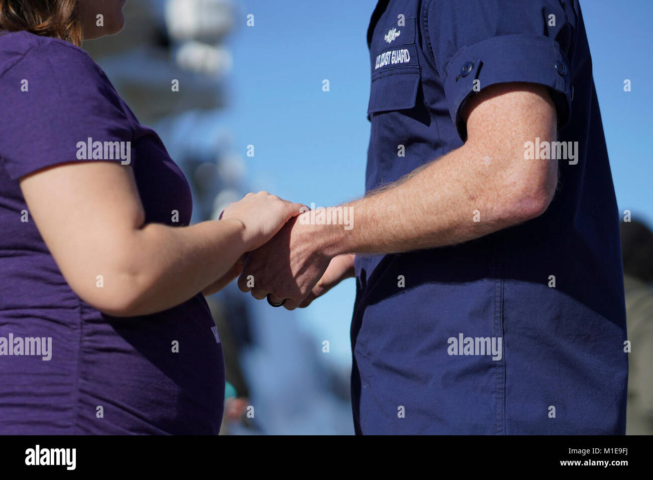 Meredith McGowan greets her husband Petty Officer 1st Class Jason ...