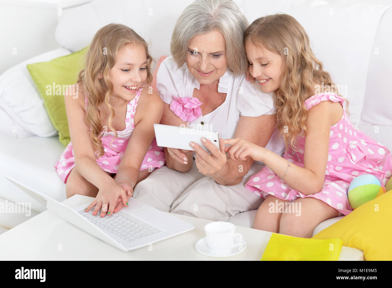 granny with her granddaughters Stock Photo - Alamy