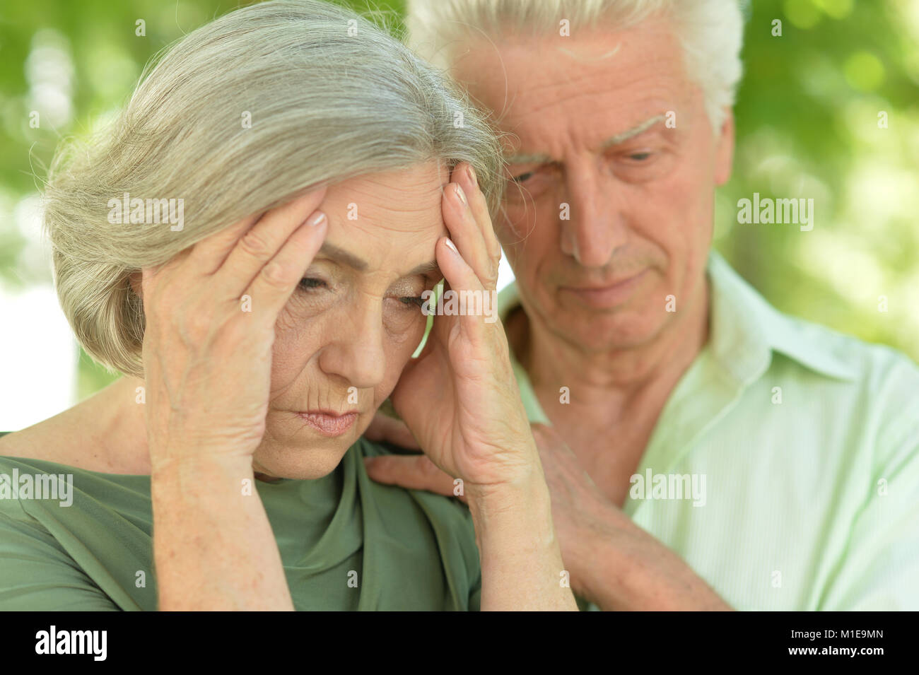 Sad senior couple Stock Photo - Alamy