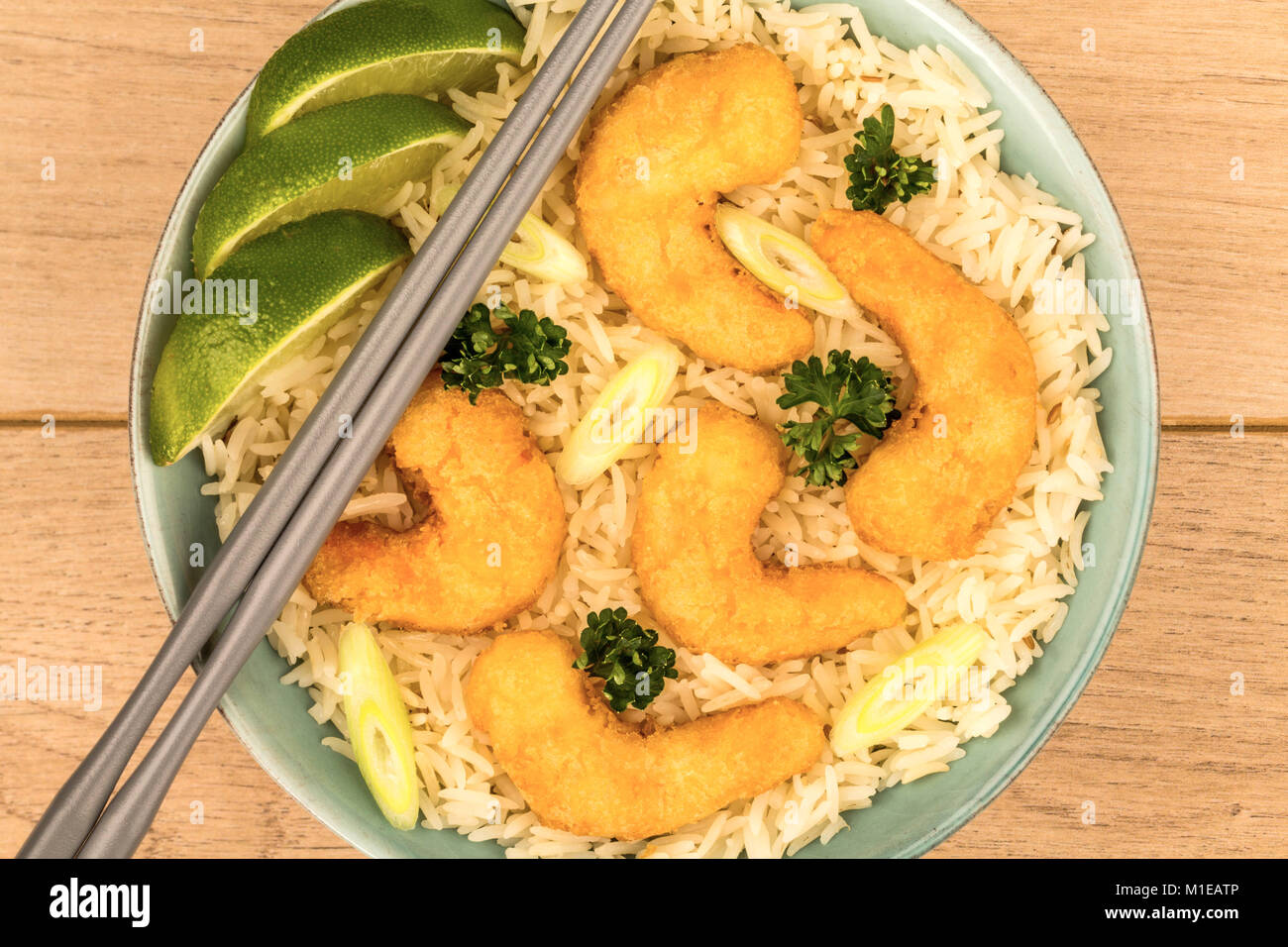 Japanese Style Tempura Fried Prawns With Rice In A Bowl Against A Light ...