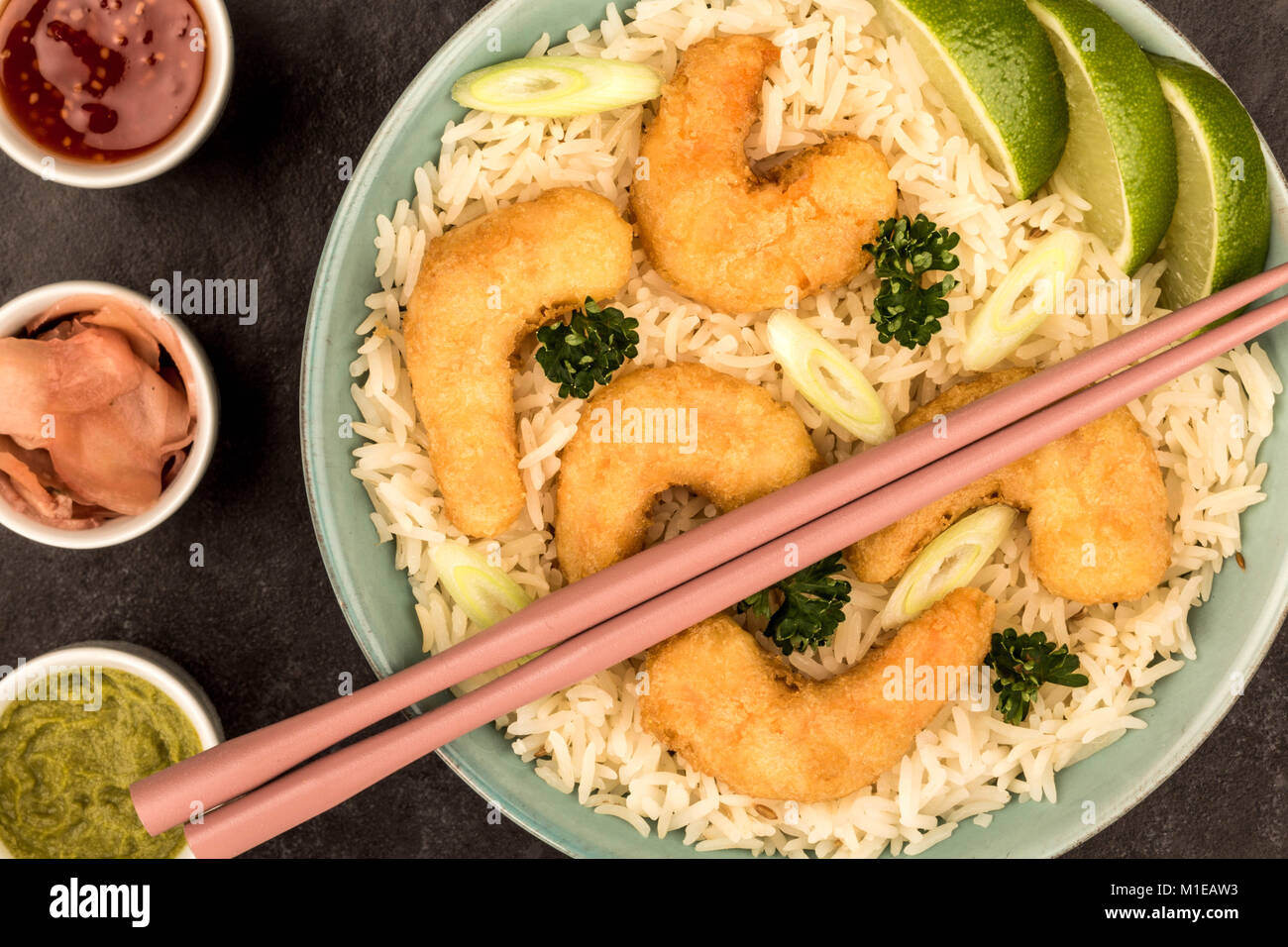 Japanese Style Tempura Fried Prawns With Rice In A Bowl Against A Black ...