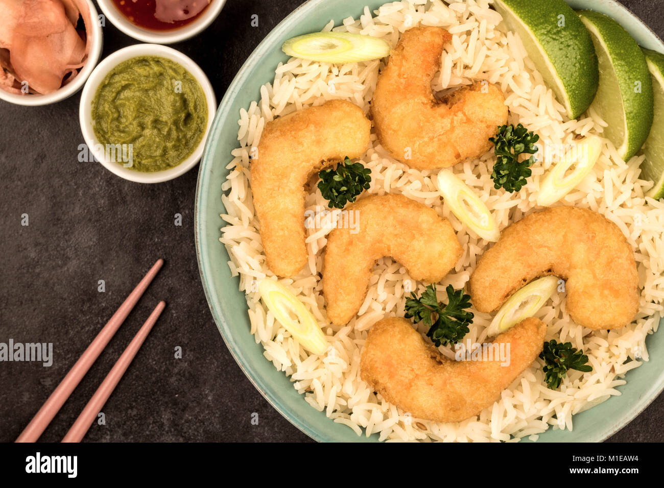 Japanese Style Tempura Fried Prawns With Rice In A Bowl Against A Black ...