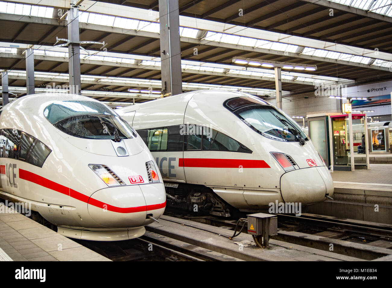 Two ICE high speed trains of Germany's DB German Railroad stand next to ...