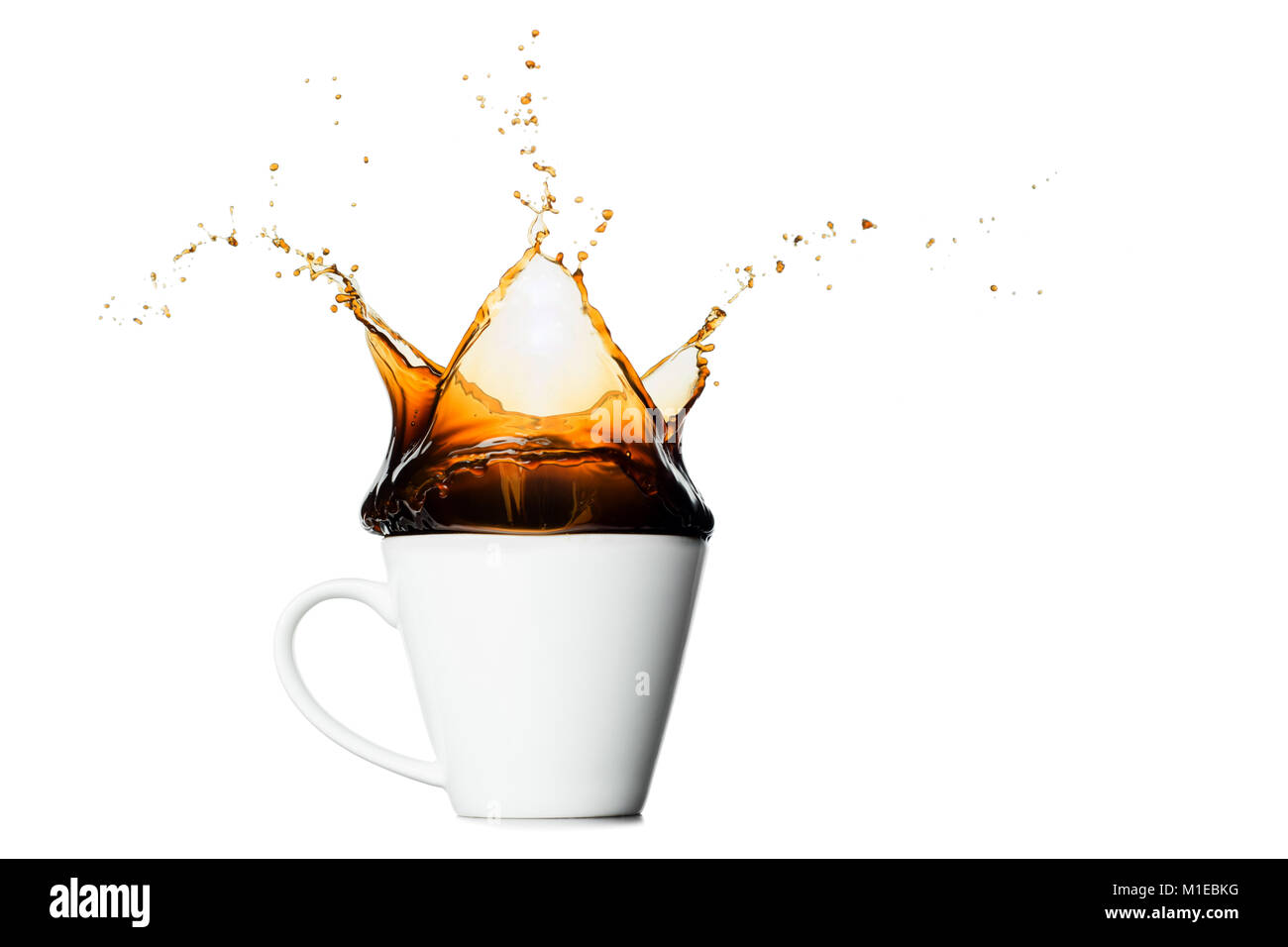 cup of splashing coffee isolated on white background Stock Photo - Alamy