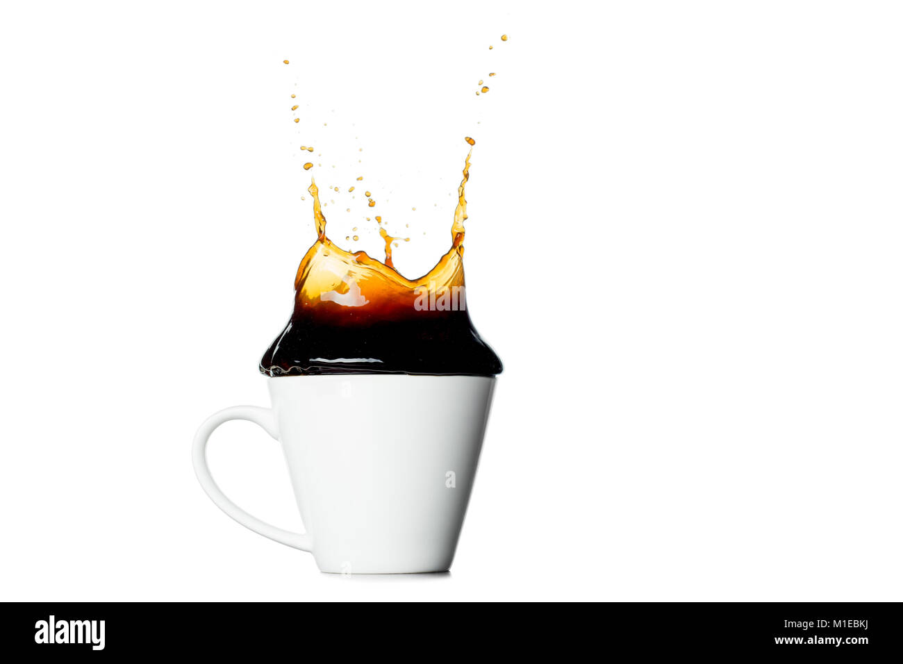 cup of splashing coffee isolated on white background Stock Photo - Alamy