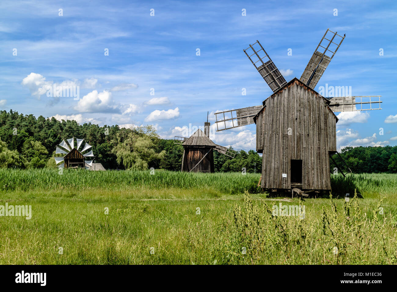 Old rustic wooden windmills at Sibiu ASTRA open air museum, Sibiu ...