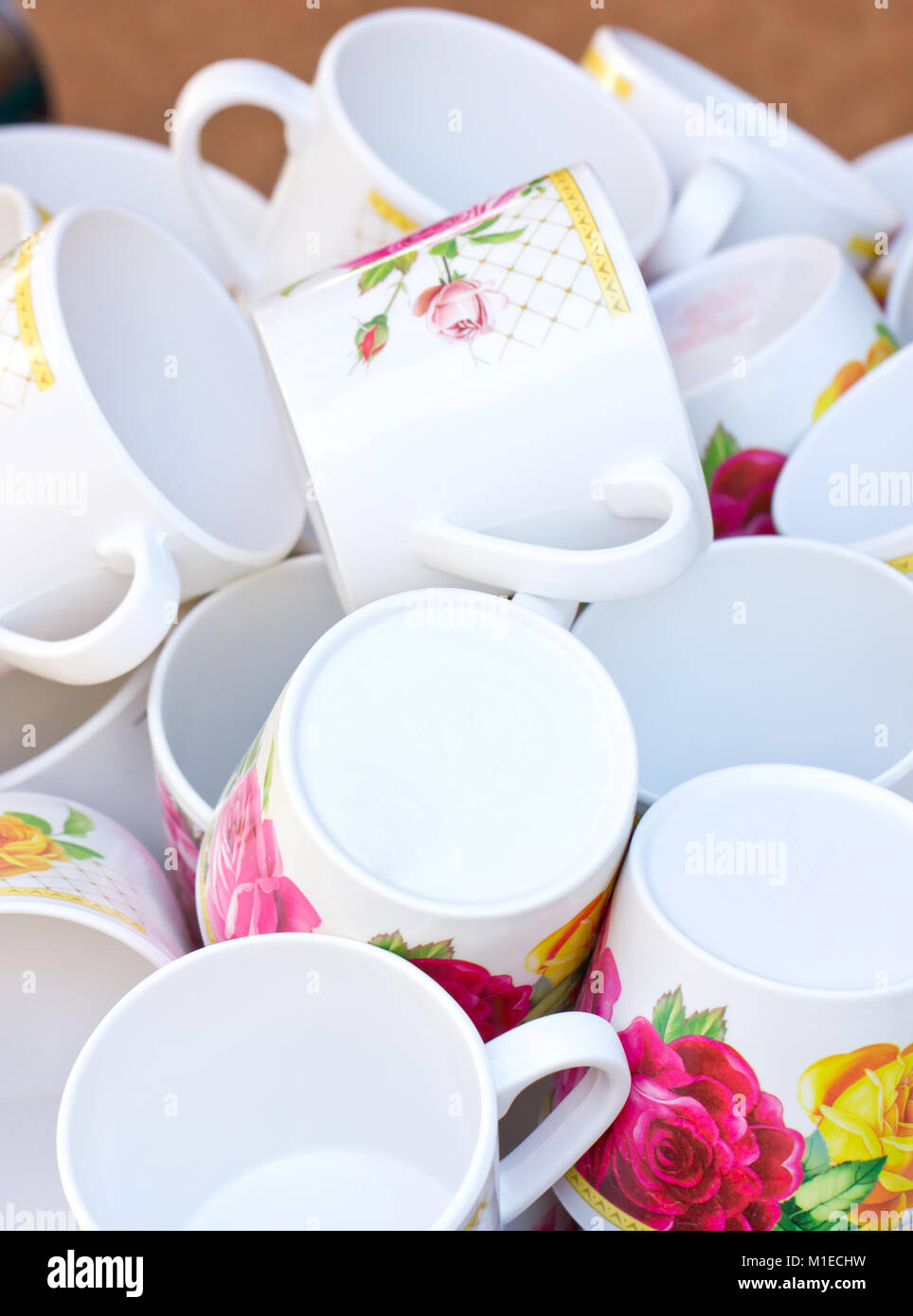 Many empty plastic mug Stock Photo - Alamy