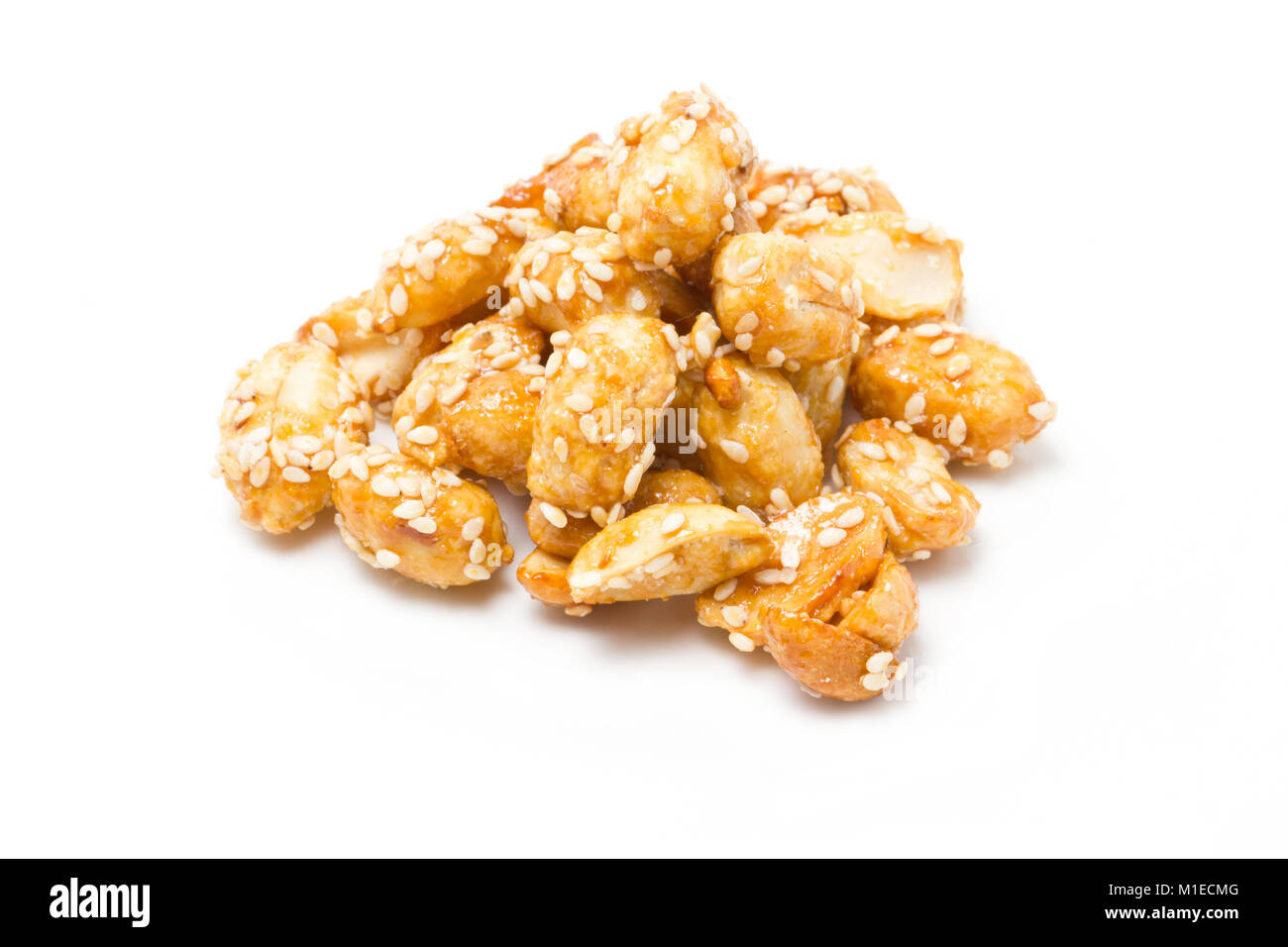 Crispy sugared nuts isolated on white Stock Photo - Alamy