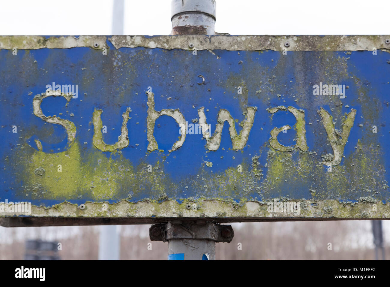 Dirty blue Subway sign, UK Stock Photo - Alamy