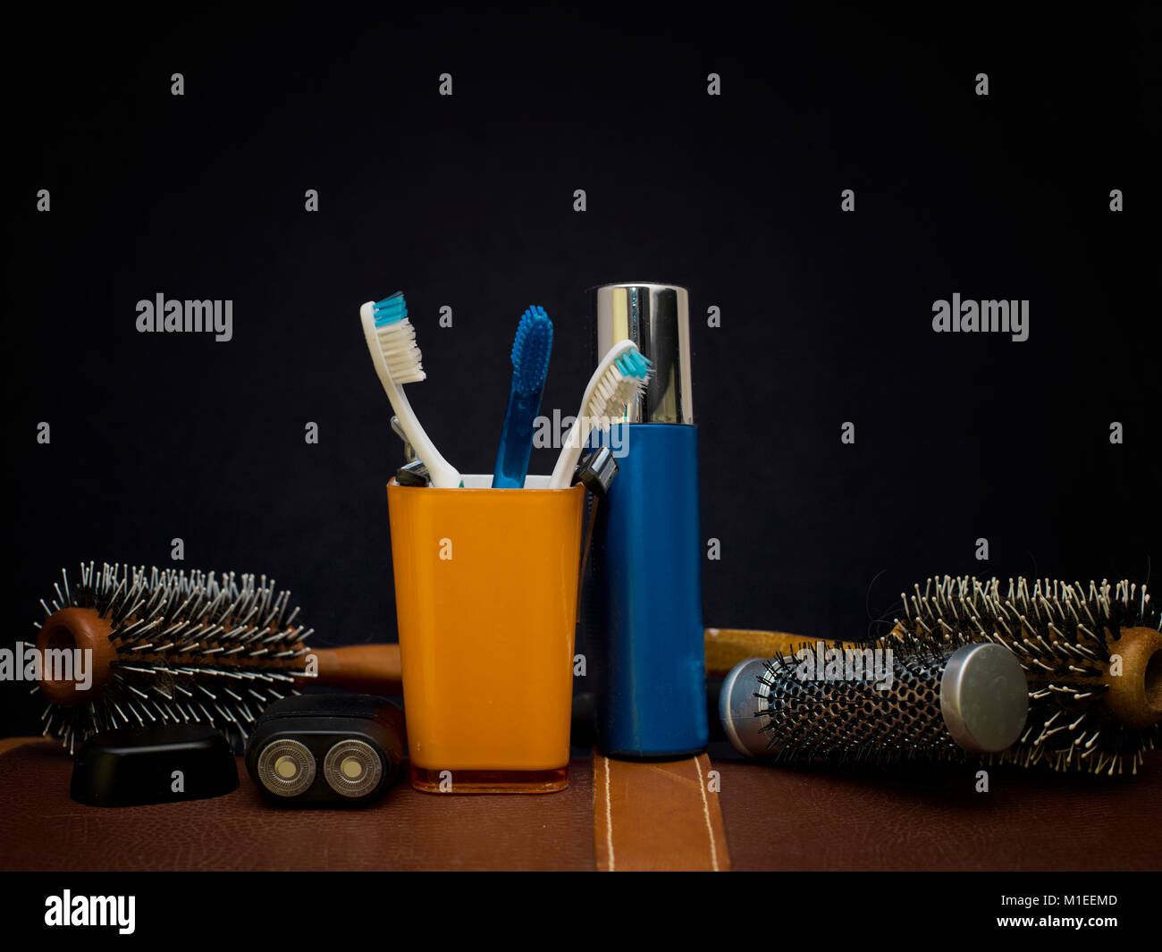 Bunch of toothbrushes, toiletries and hairbrushes, studio closeup Stock ...