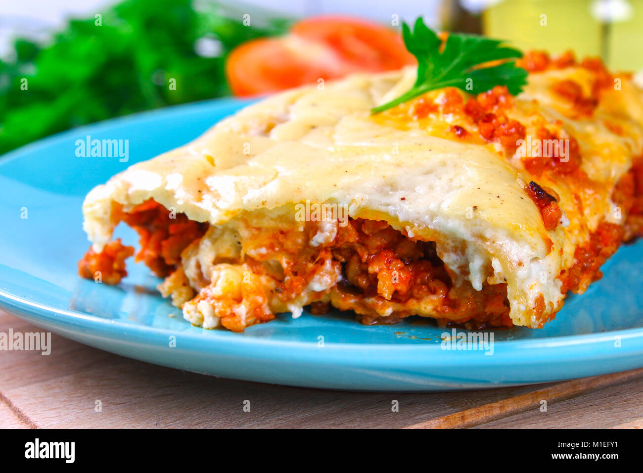 Traditional Italian pasta cannelloni. Baked tubes stuffed with minced ...
