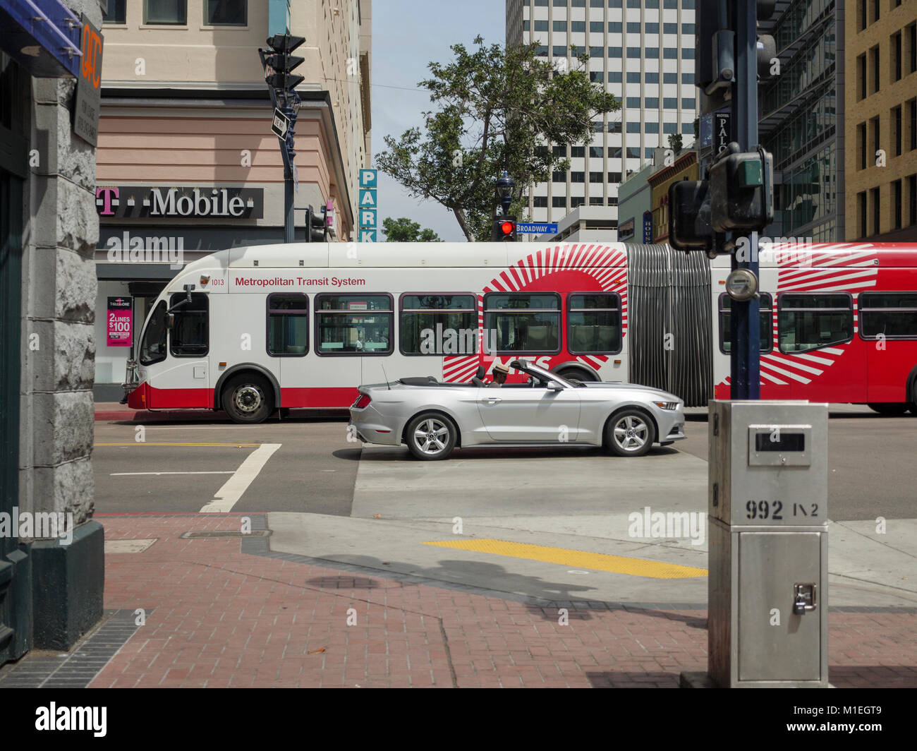 A San Deigo Metropolitan Transit System Articulated Bus In Downtown ...