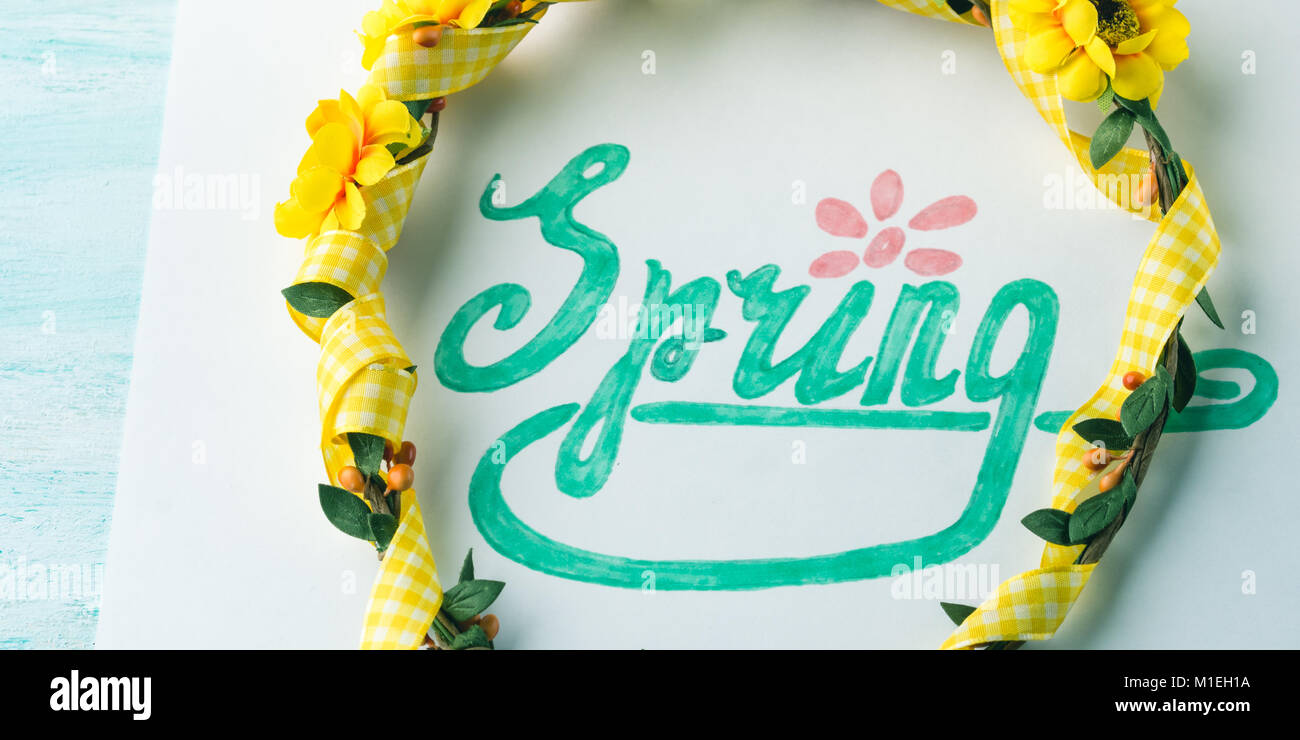 Spring word spelling by hand lettering and flower wreath girl head band ...