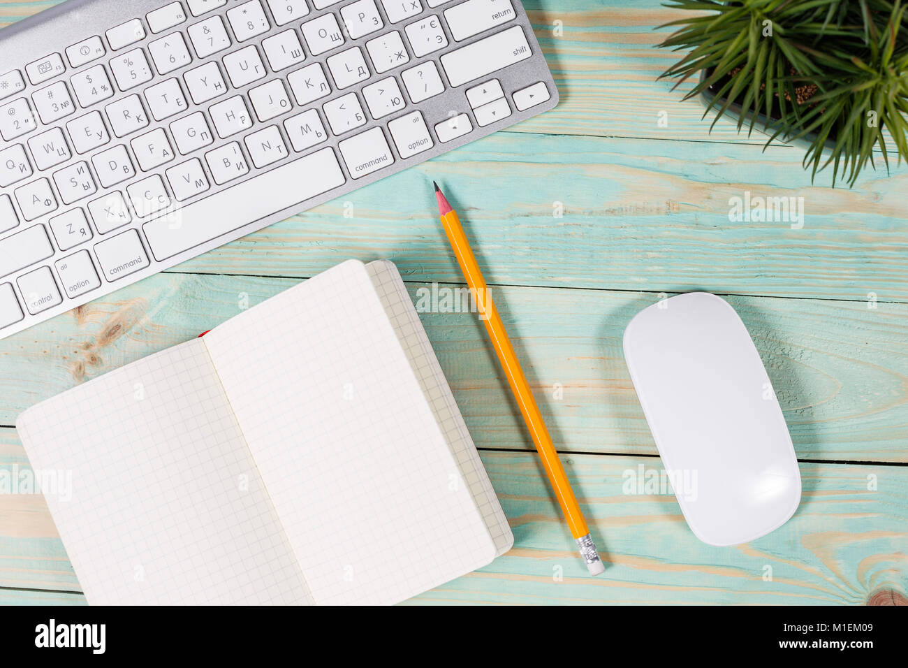 Modern green wooden office desk with laptop computer. Minimal concept ...