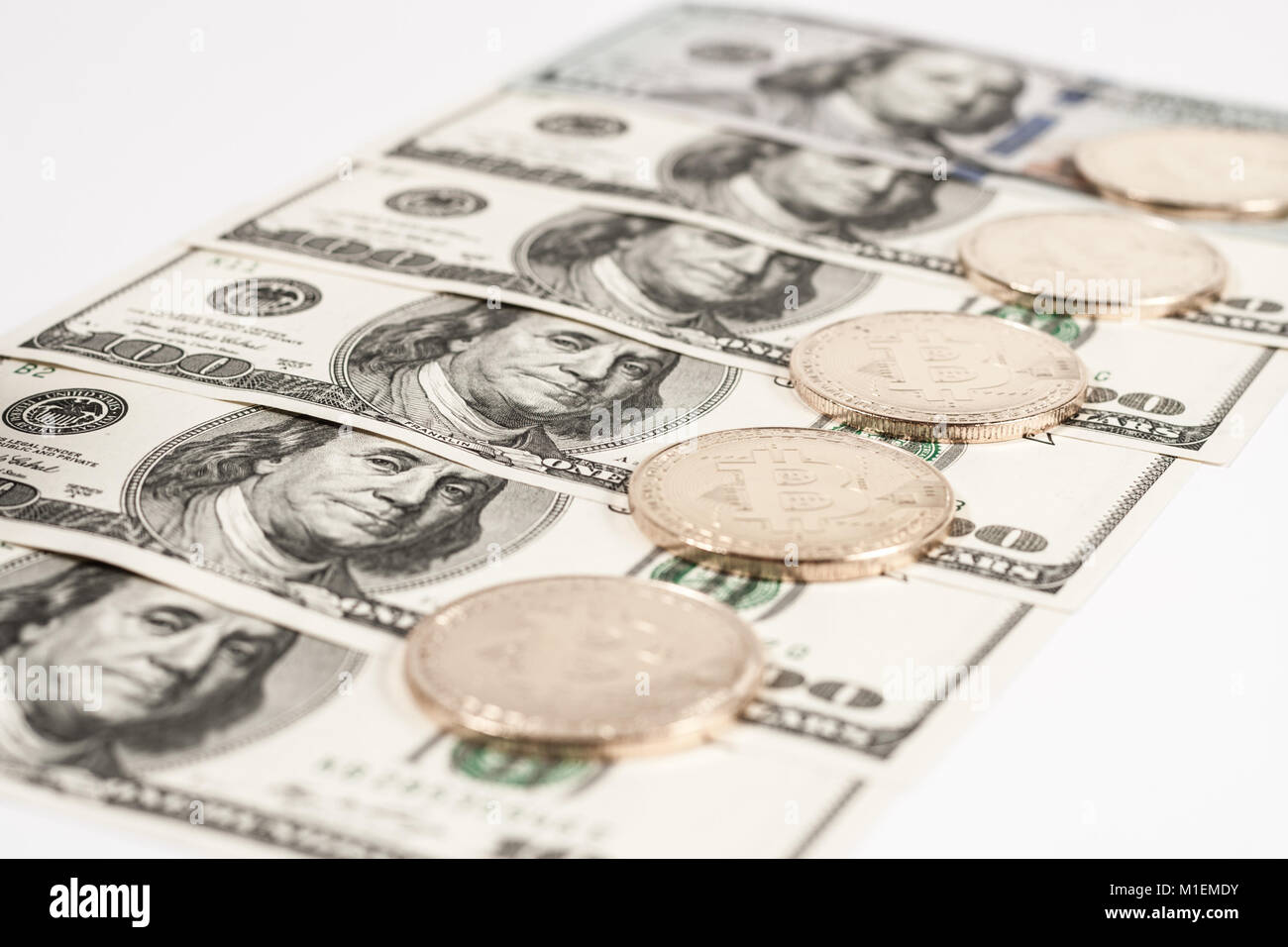 New virtual money Golden bitcoin coin on us dollars background ...