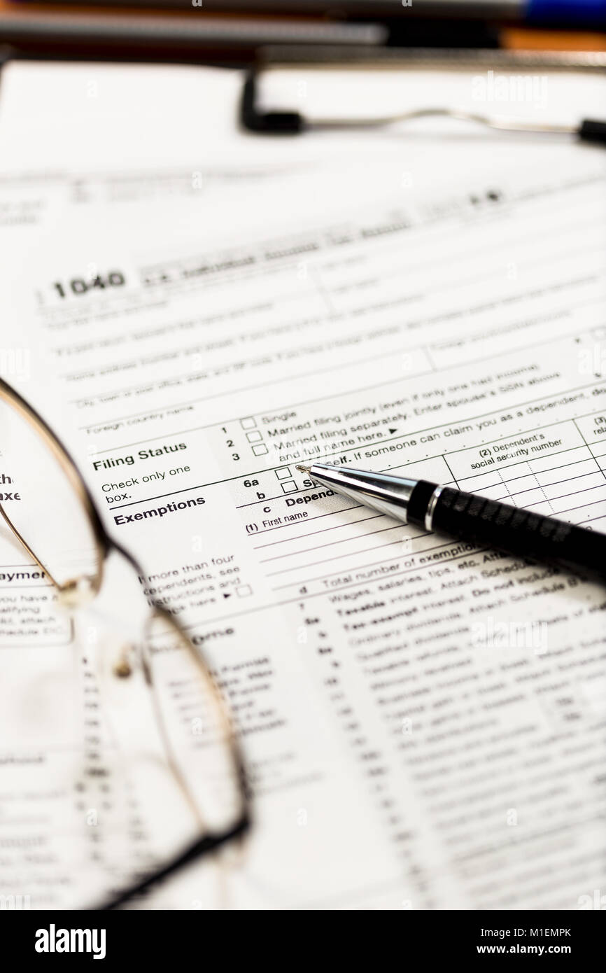 Closeup of US tax forms 1040. Useful as US tax background Stock Photo ...