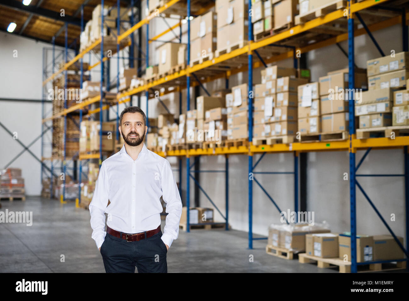 Portrait of a male warehouse worker or supervisor Stock Photo - Alamy