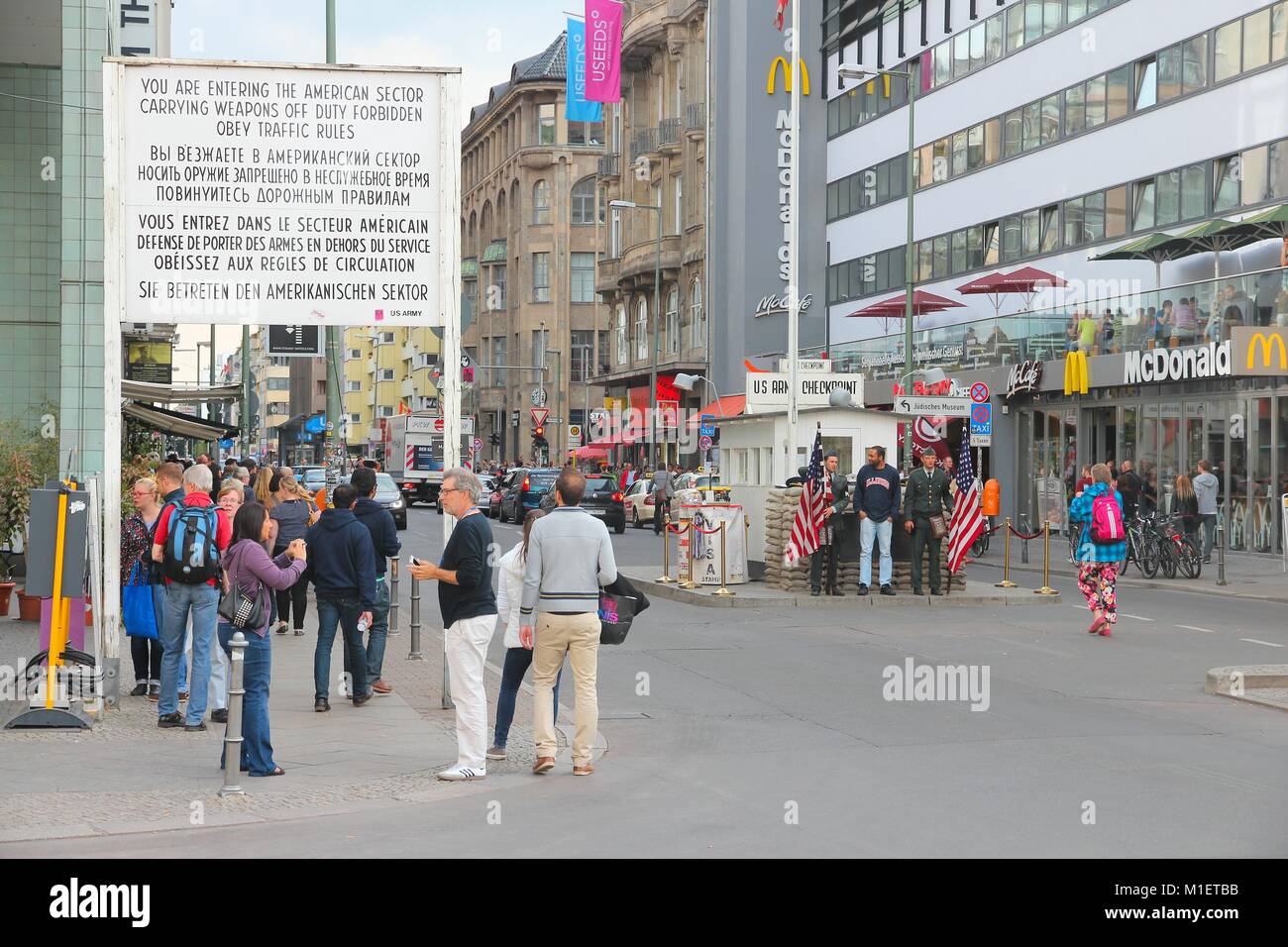 BERLIN, GERMANY - AUGUST 26, 2014: People visit famous Checkpoint ...