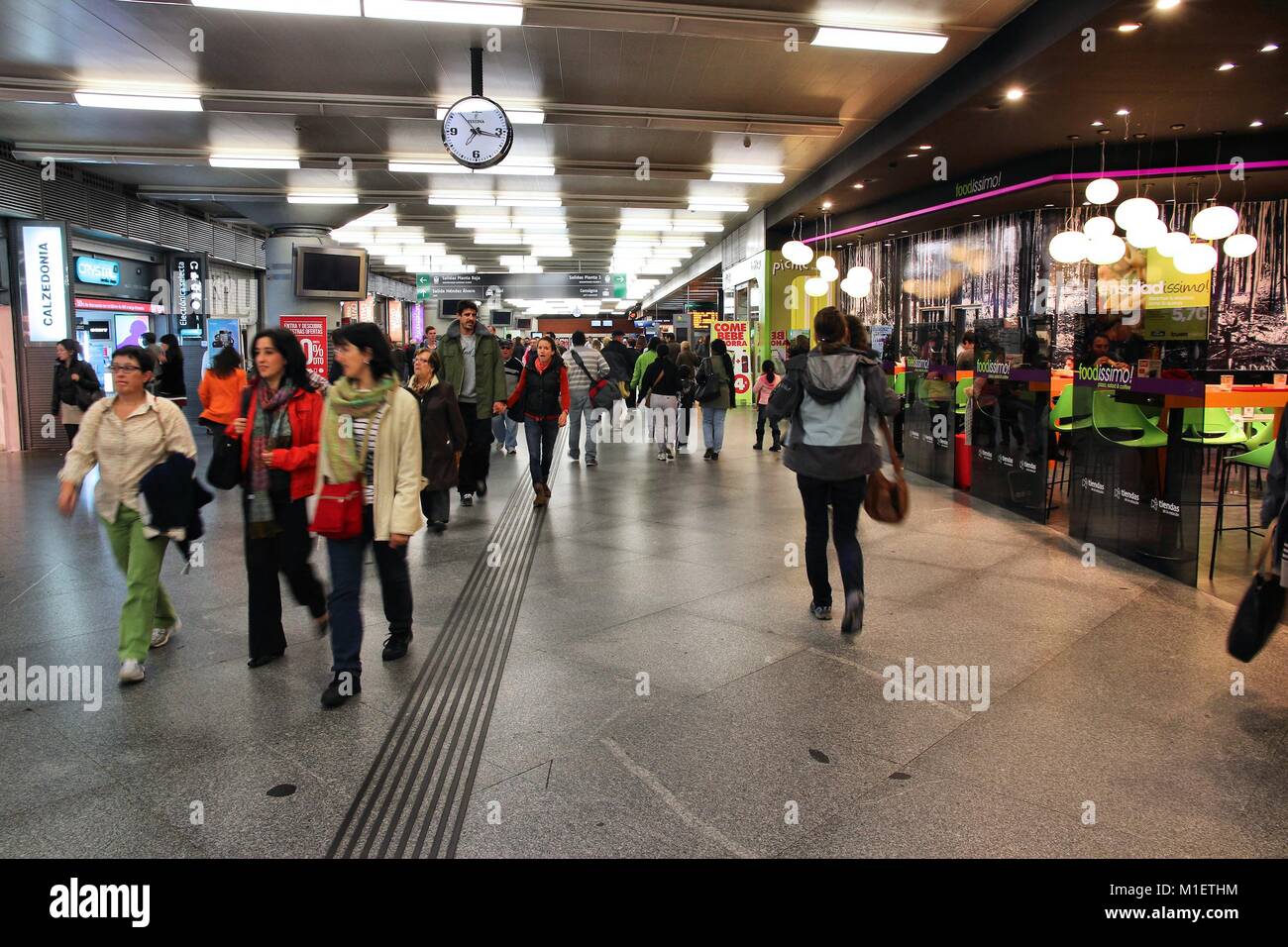 MADRID - OCTOBER 21: People walk in Atocha station on October 21, 2012 ...
