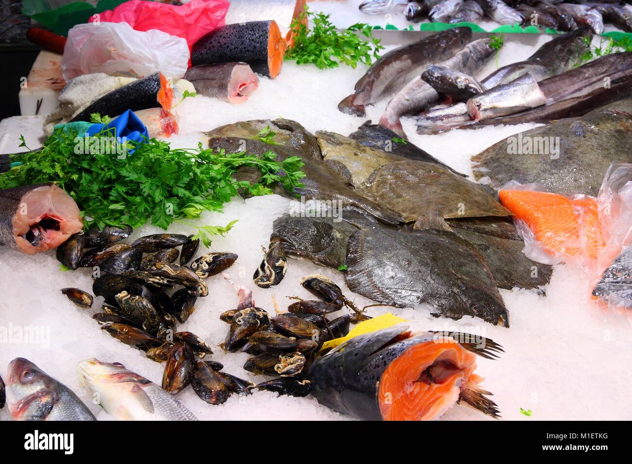 Fish market at Boqueria market in Barcelona, Spain. Fresh sea food ...
