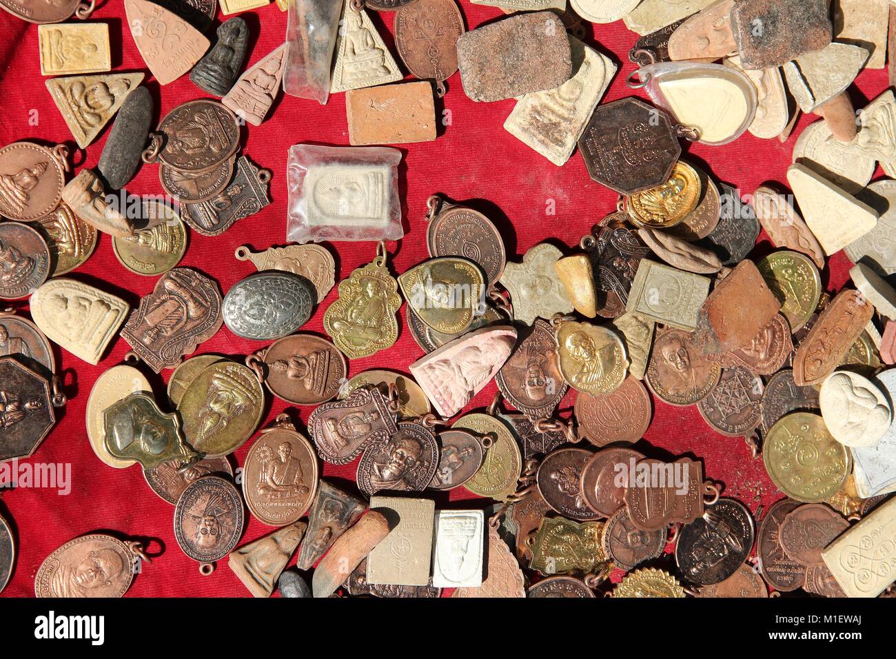 Bangkok, Thailand - famous amulet market with stone and metal Buddhist ...