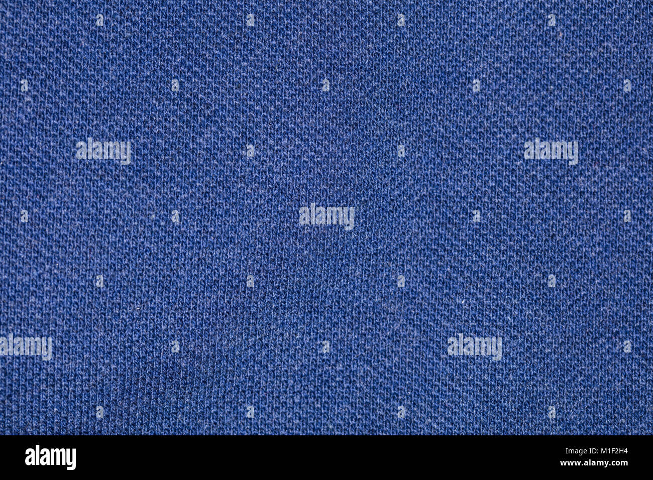 blue fabric, closeup on stitch Stock Photo - Alamy