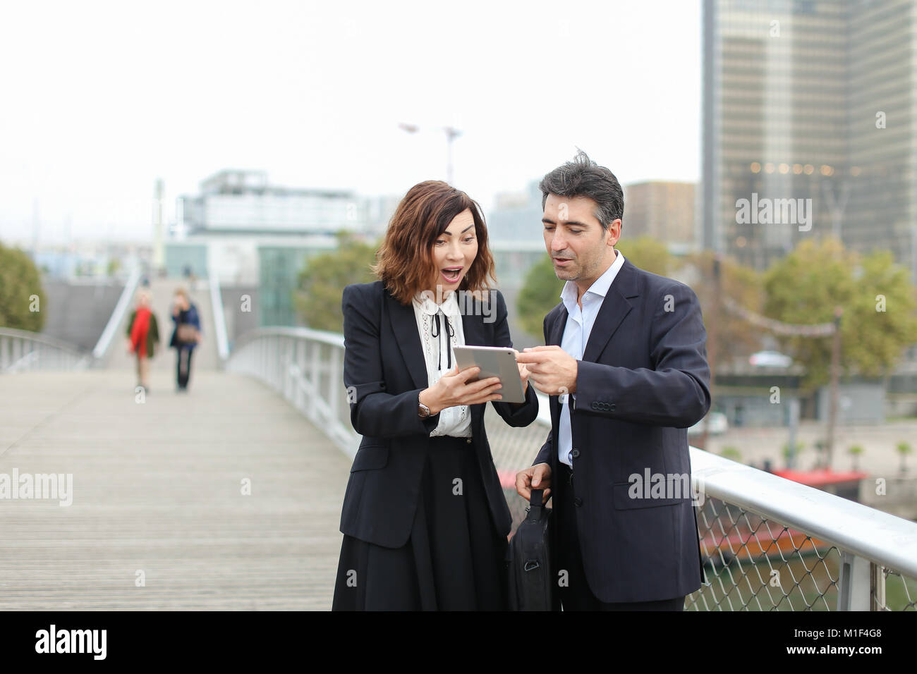 Married business couple make purchases by credit card Stock Photo - Alamy